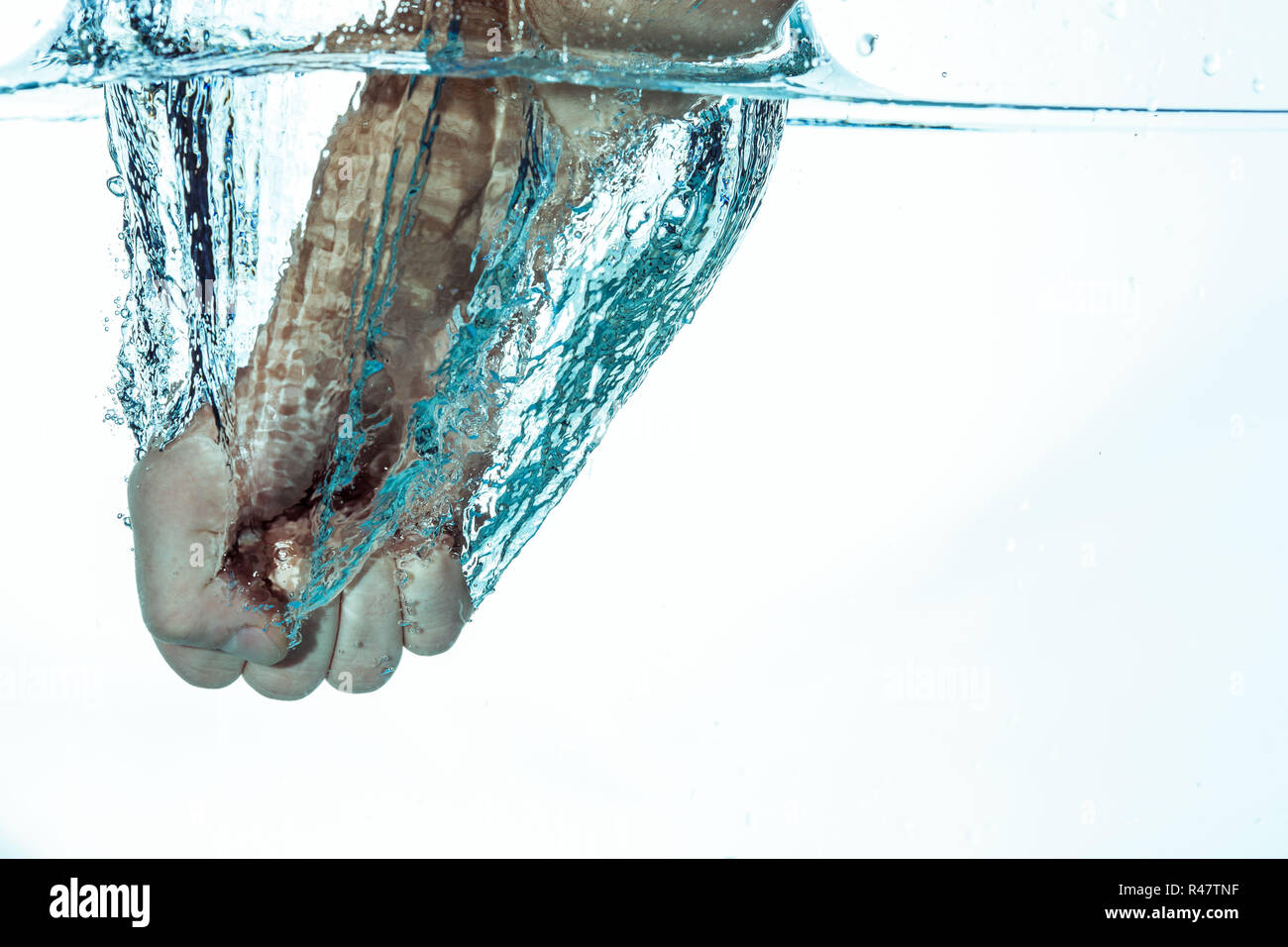 splash male hand into the water Stock Photo - Alamy