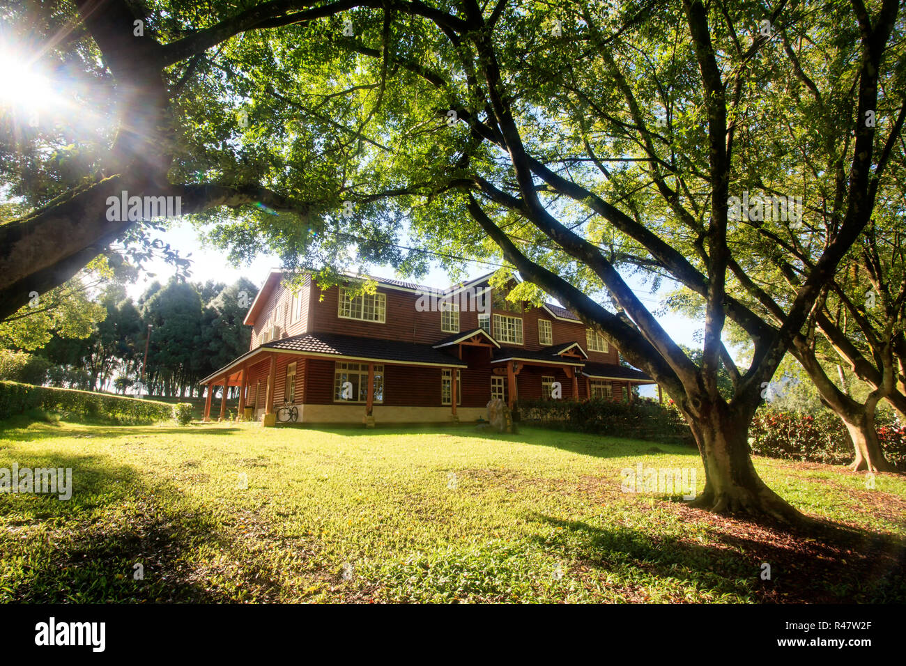 Nice house on the sunrise time with nice background Stock Photo - Alamy