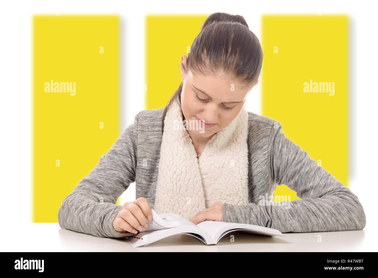 beautiful smiling girl reading a book Stock Photo - Alamy