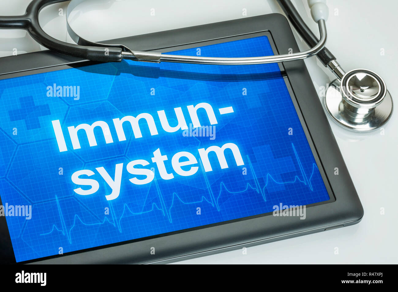 tablet with the text immune system on display Stock Photo - Alamy