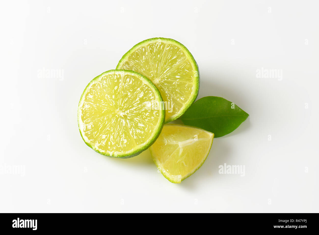 Fresh lime fruit slices Stock Photo - Alamy