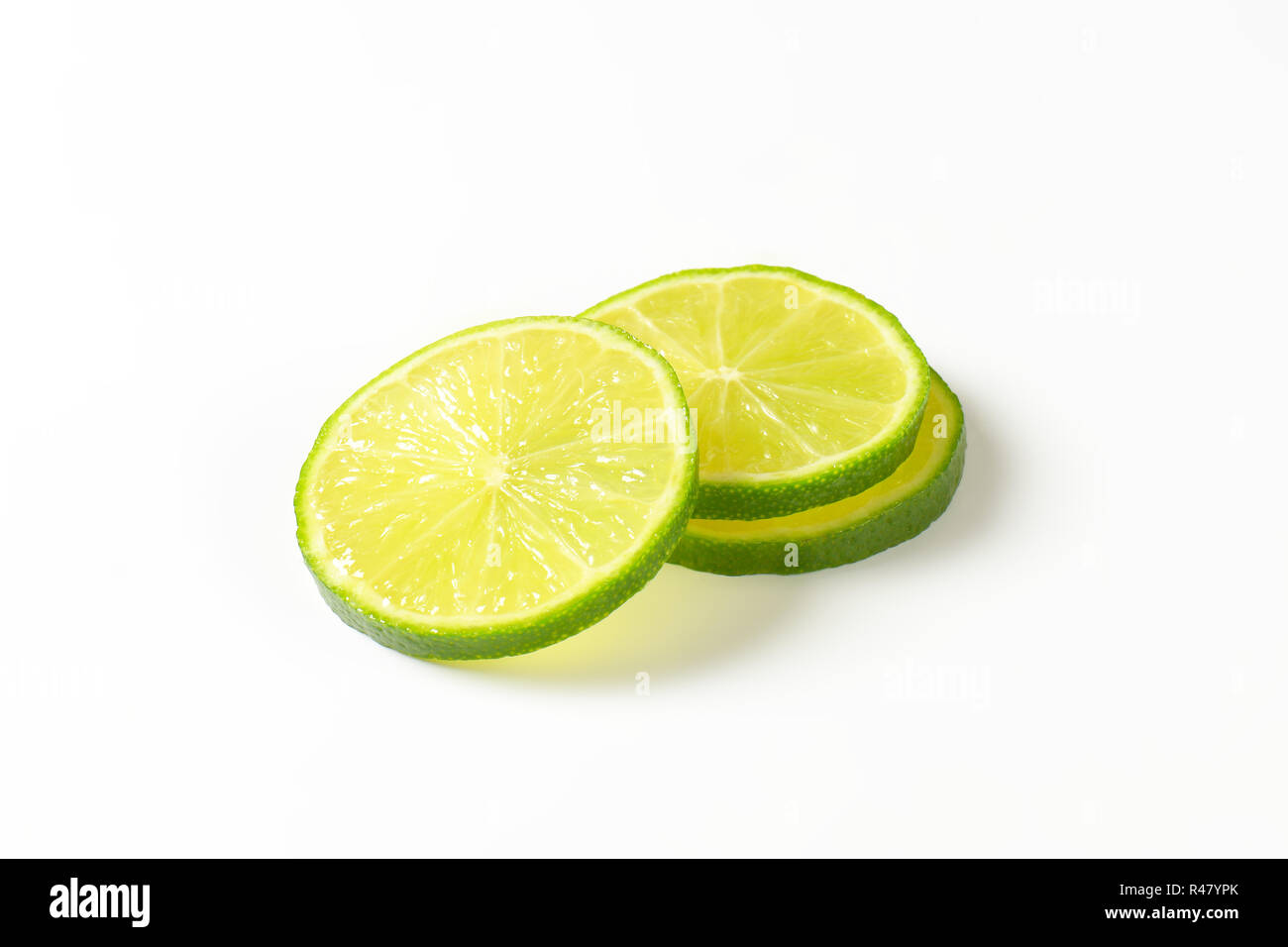 Fresh lime fruit slices Stock Photo - Alamy