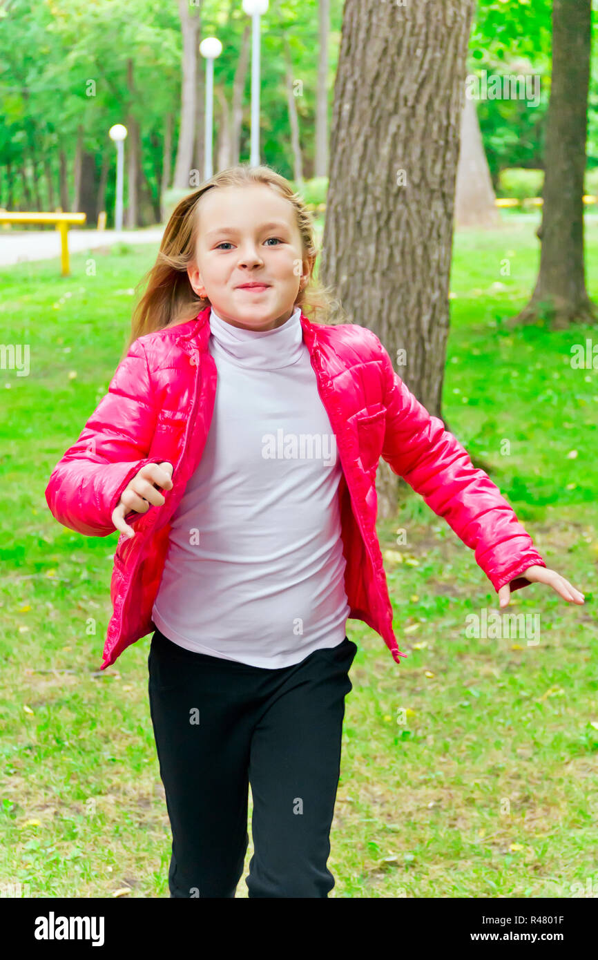 Cute running girl Stock Photo - Alamy