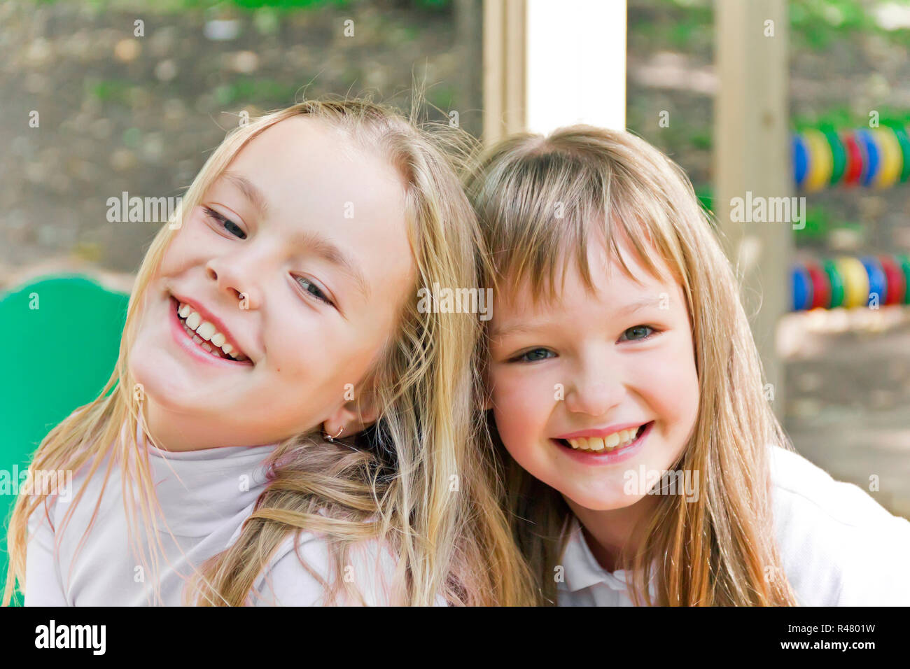 Cute two smiling girls Stock Photo - Alamy
