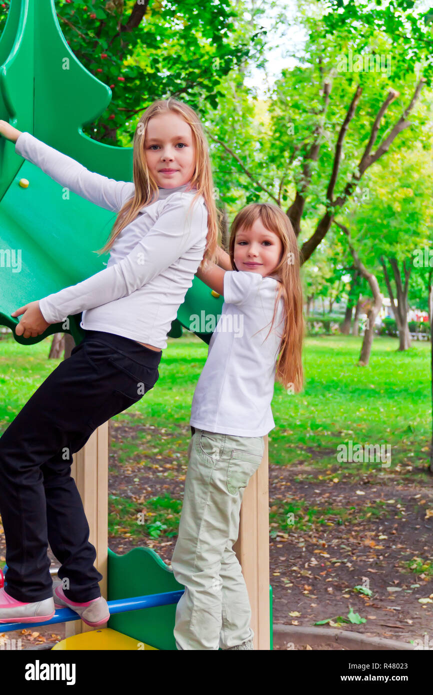 Cute two playing girls Stock Photo - Alamy