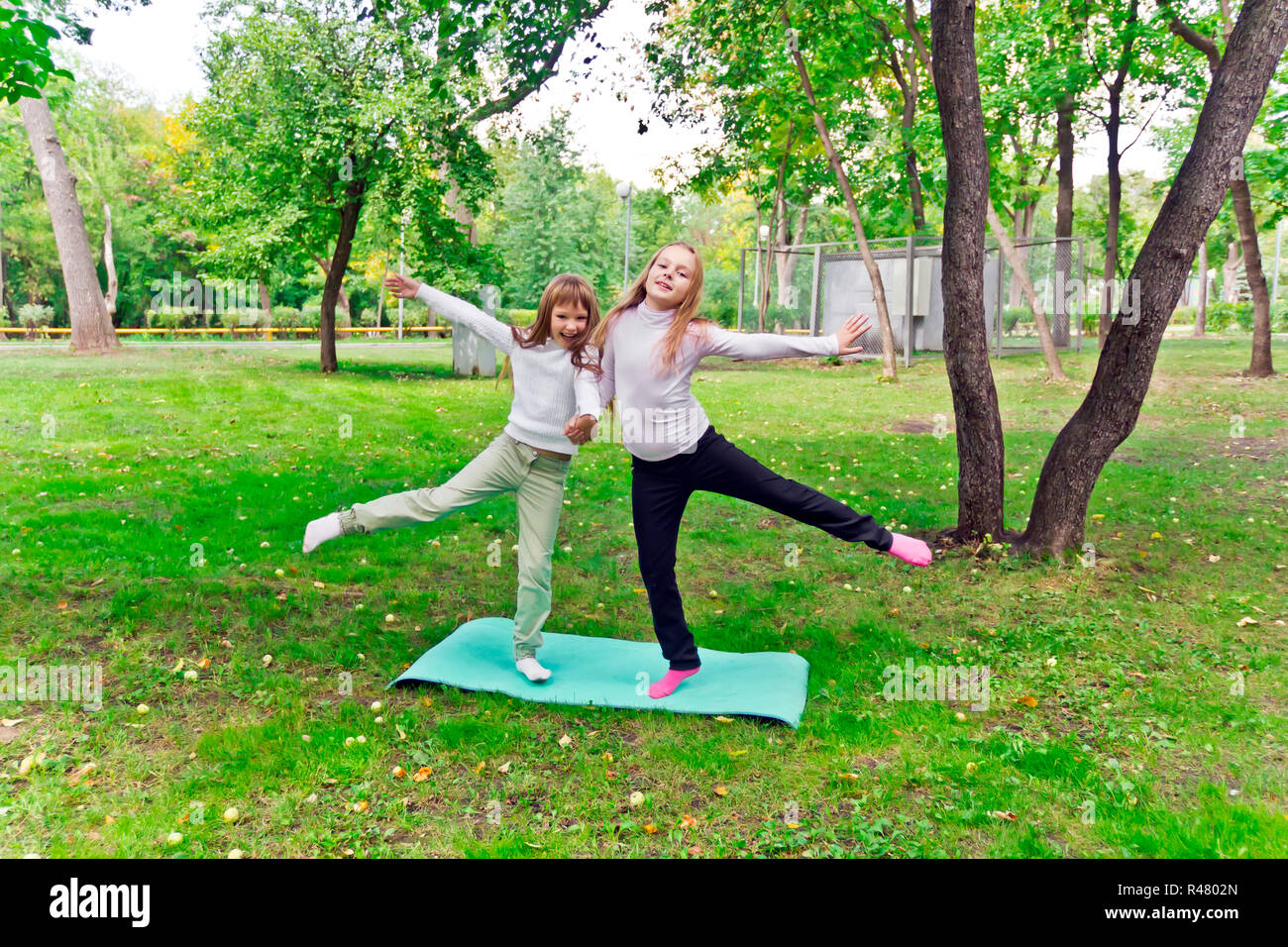 Cute two playing girls Stock Photo - Alamy