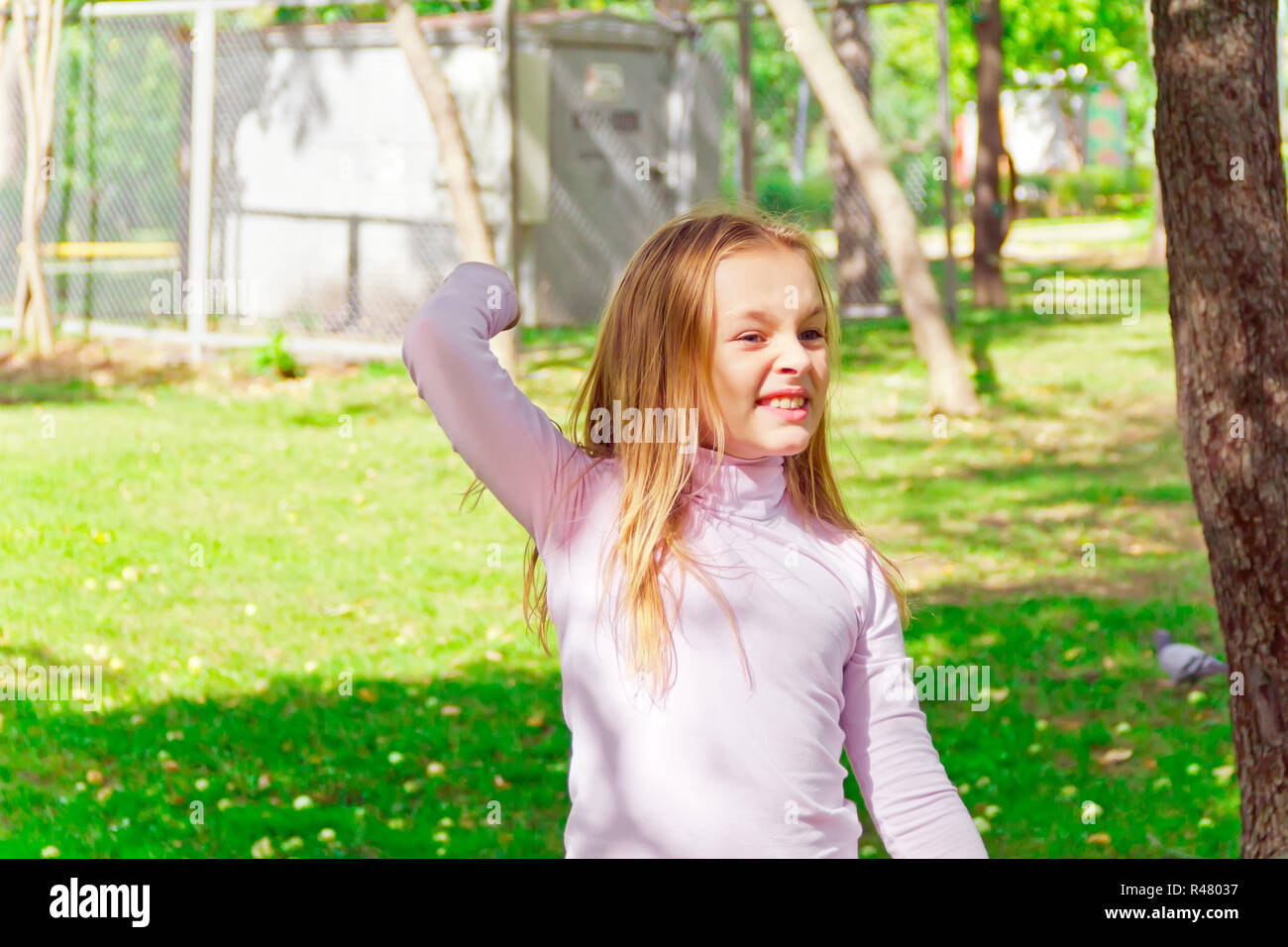 Cute playing girl Stock Photo - Alamy
