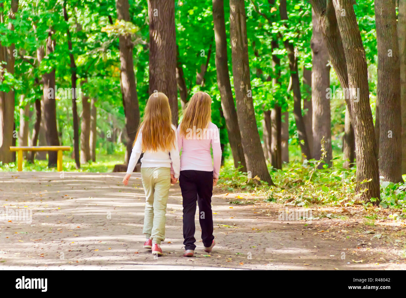 Cute female preschooler walking hi-res stock photography and images - Alamy