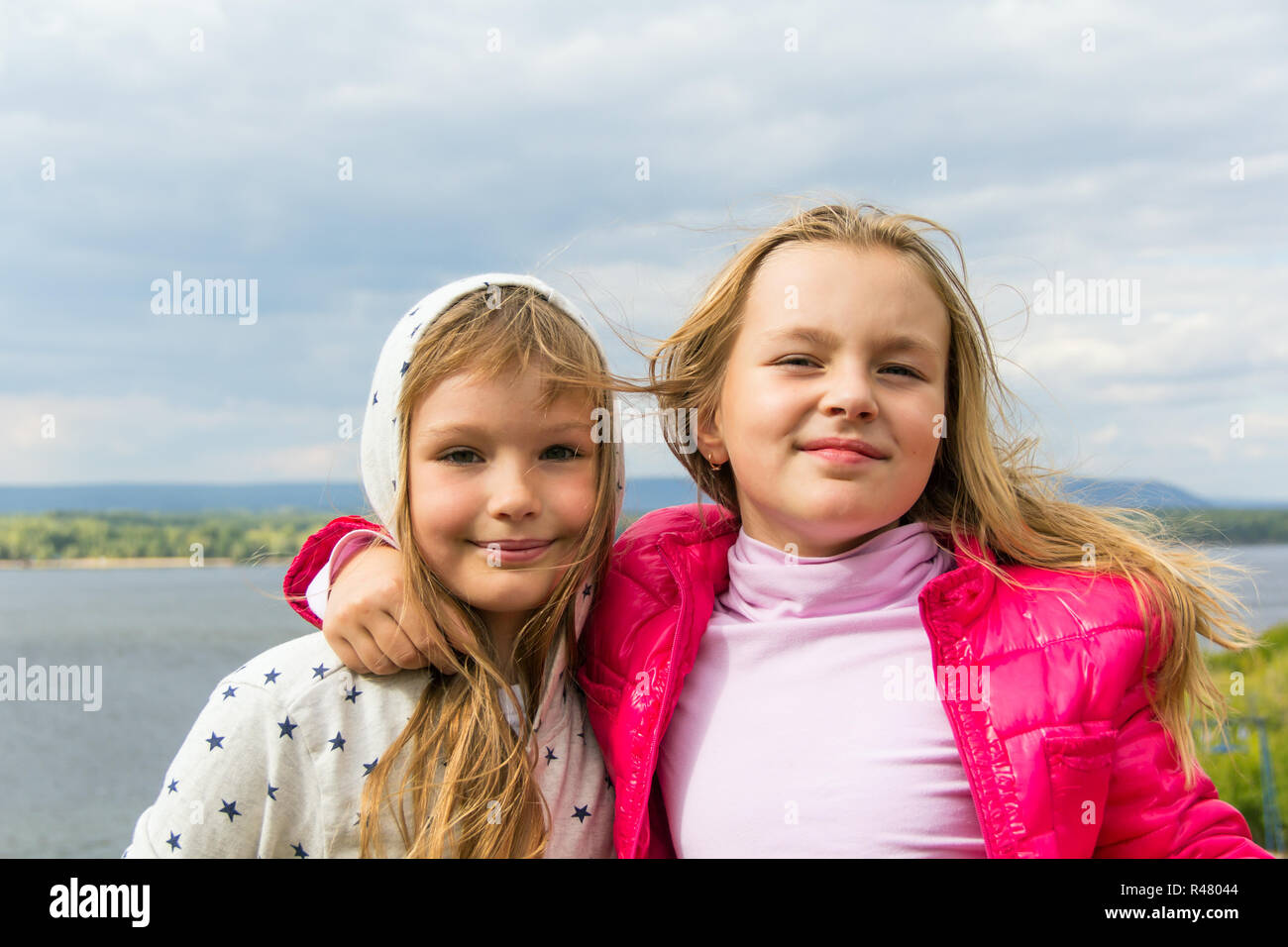 Cute two playing girls Stock Photo - Alamy