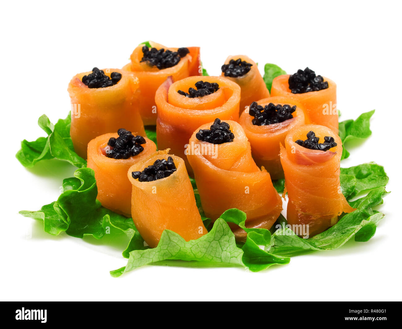 Salmon Rolls with Caviar Stock Photo - Alamy