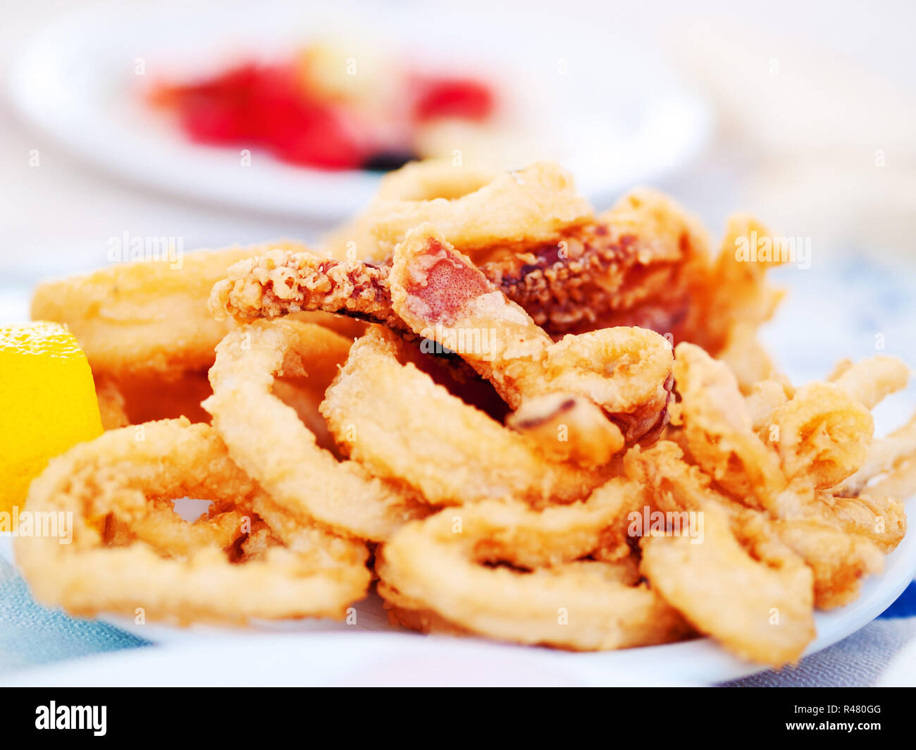 Fried squid in a greek restaurant Stock Photo - Alamy