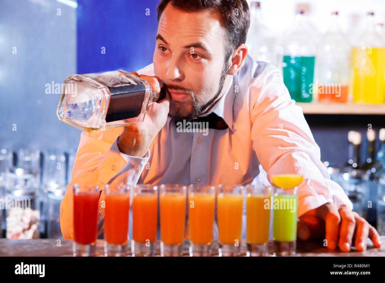 Barman at work, preparing cocktails Stock Photo - Alamy