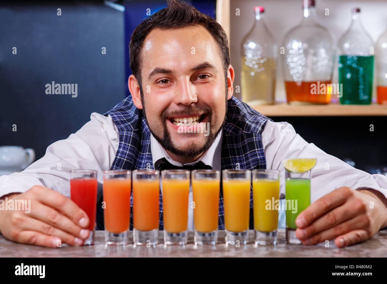 Barman at work, preparing cocktails Stock Photo - Alamy