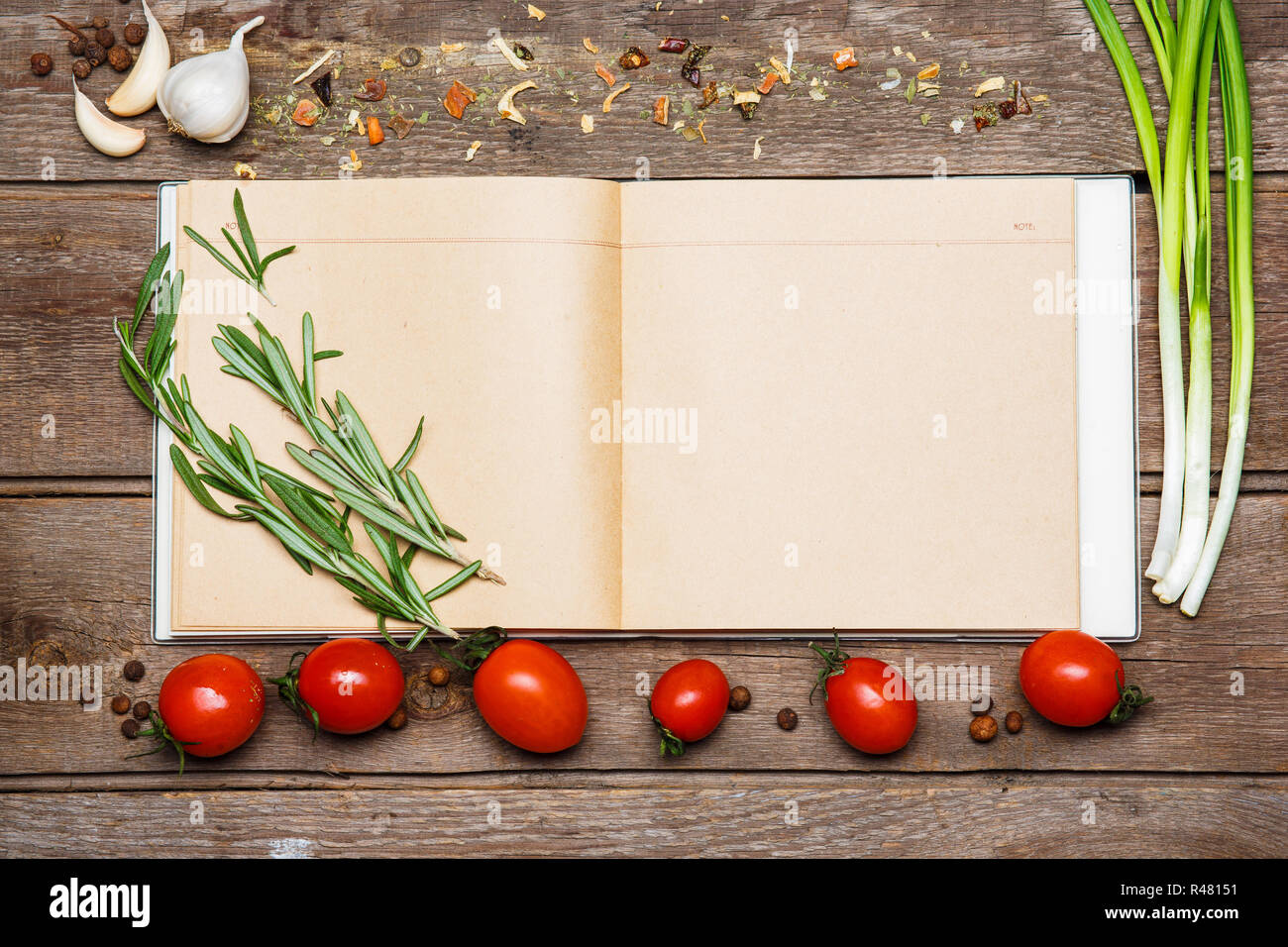 Open blank recipe book on brown wooden background Stock Photo - Alamy