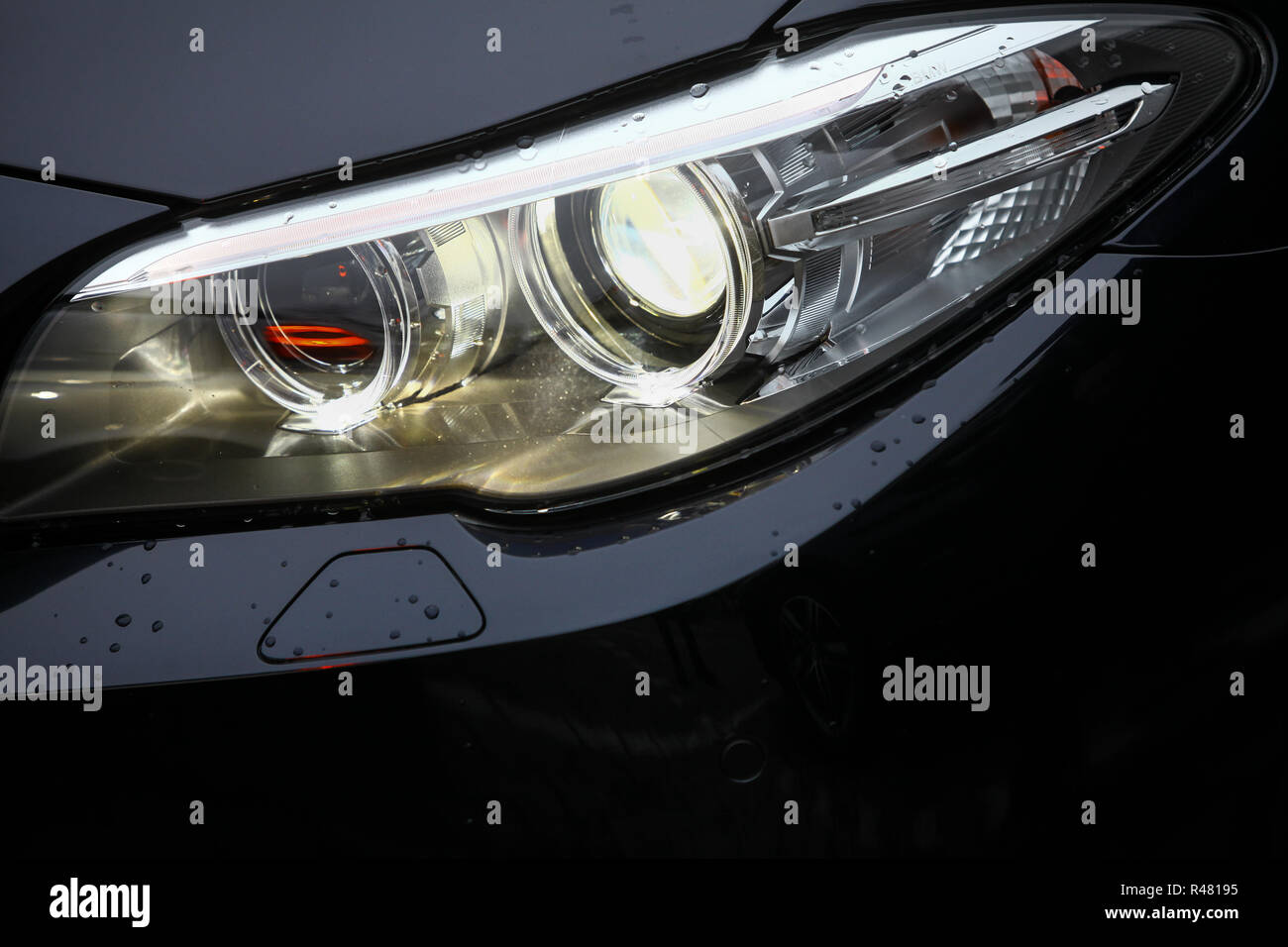 Car headlight detail Stock Photo - Alamy