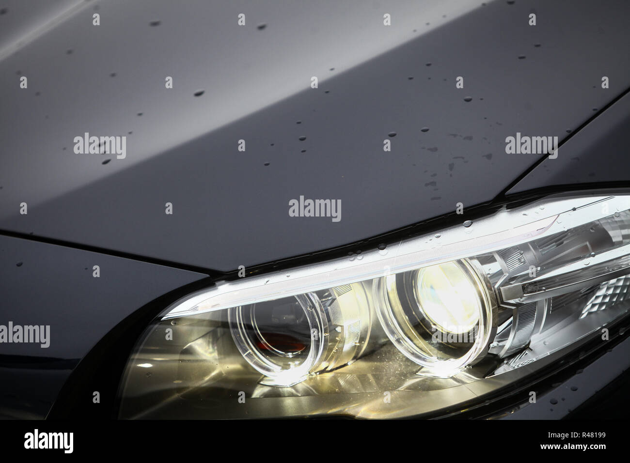 Car headlight detail Stock Photo - Alamy