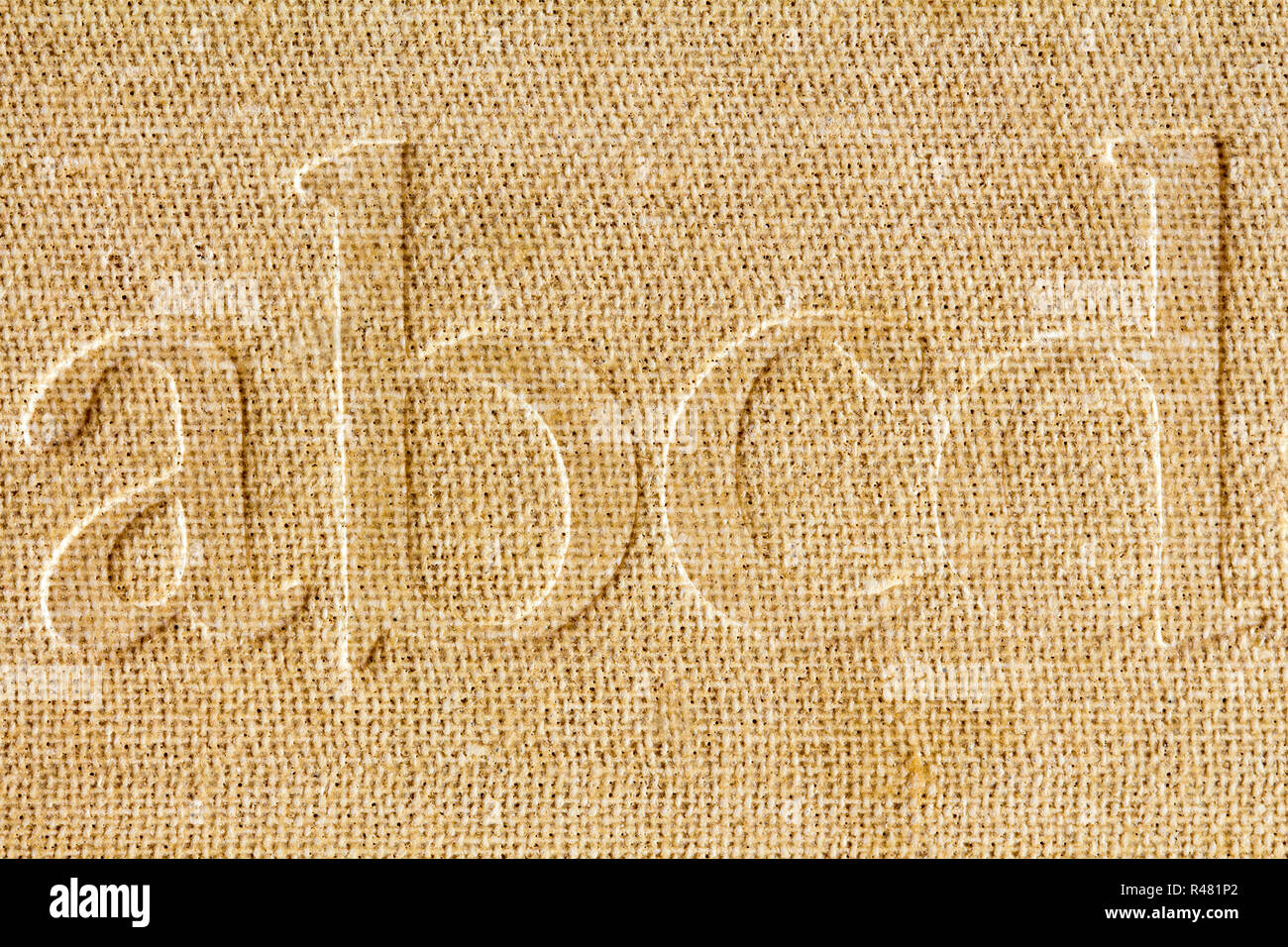 Alphabet printed on a background of old paper Stock Photo - Alamy