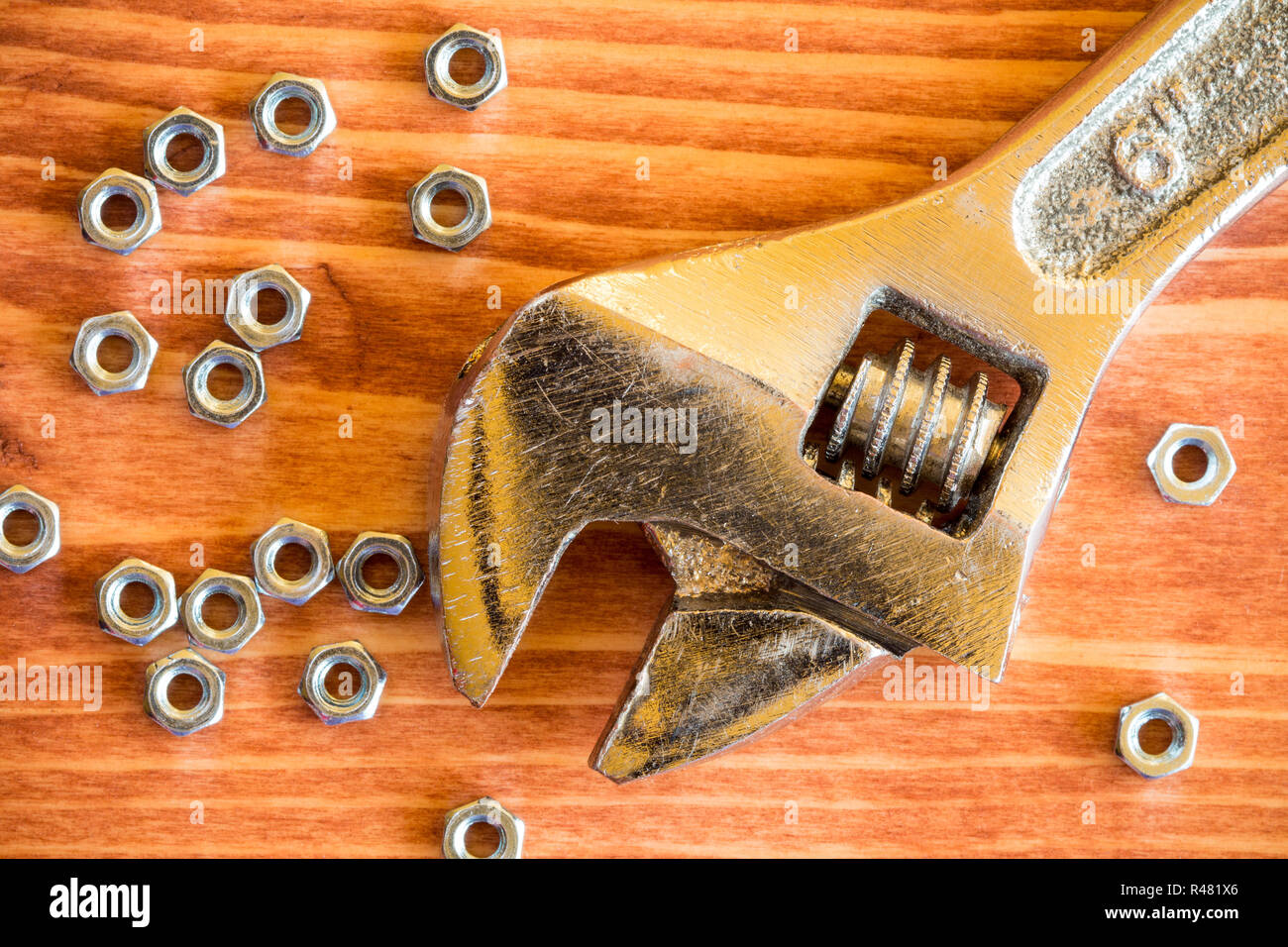 Wrench tool and nuts Stock Photo - Alamy
