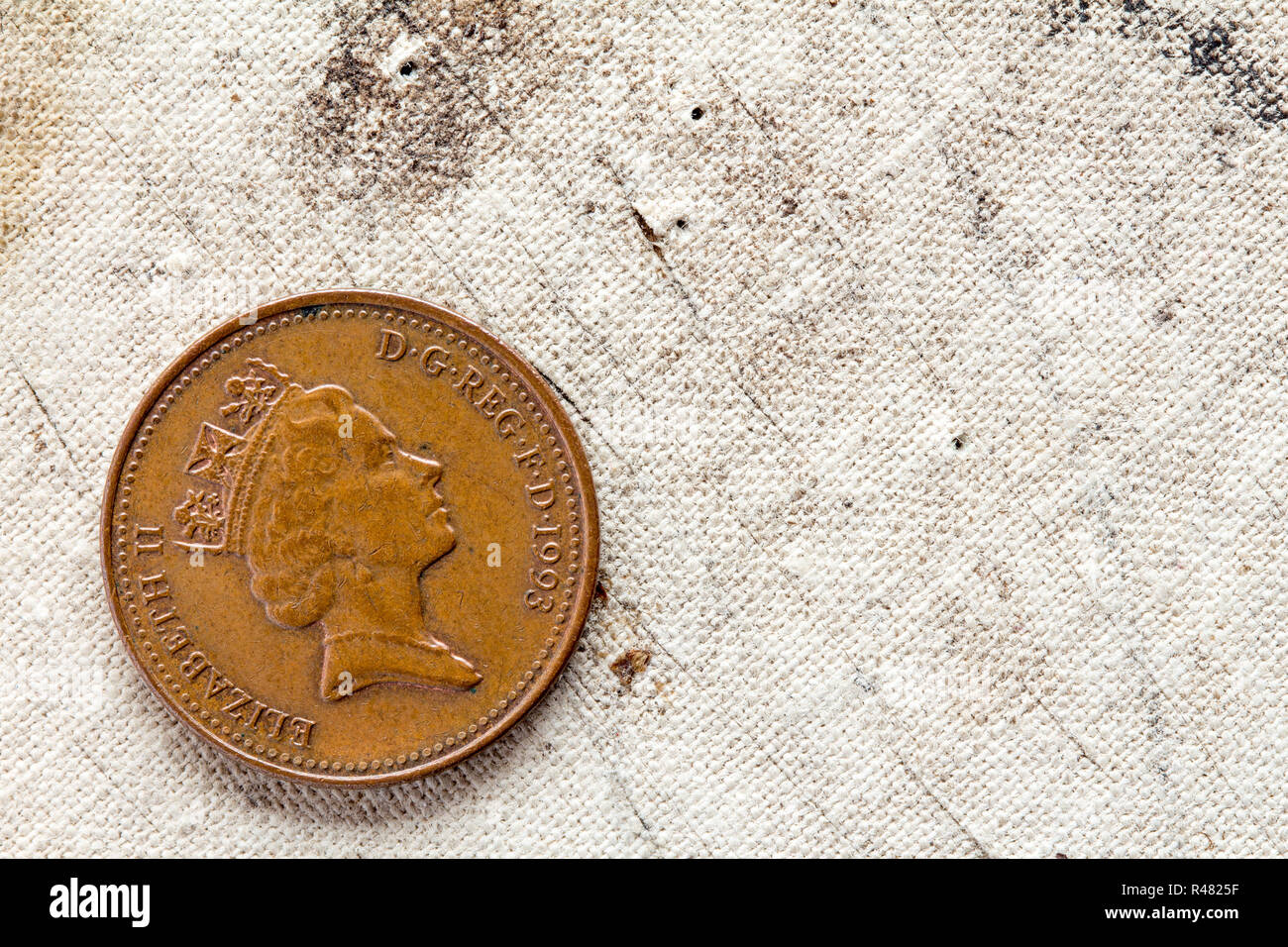 One penny on canvas background Stock Photo - Alamy