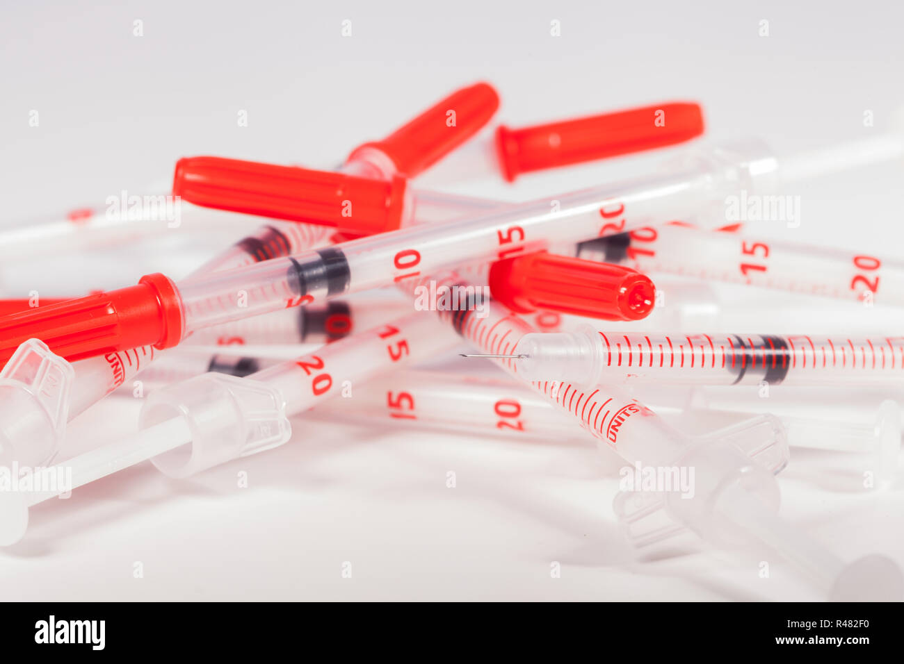 small syringes with hypodermic needles and caps drug diabetes Stock ...