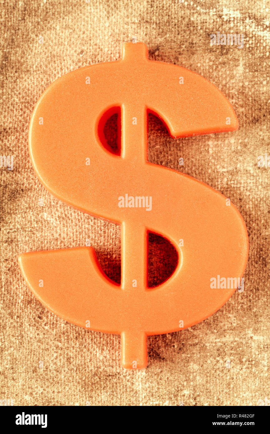 Plastic dollar symbol Stock Photo - Alamy