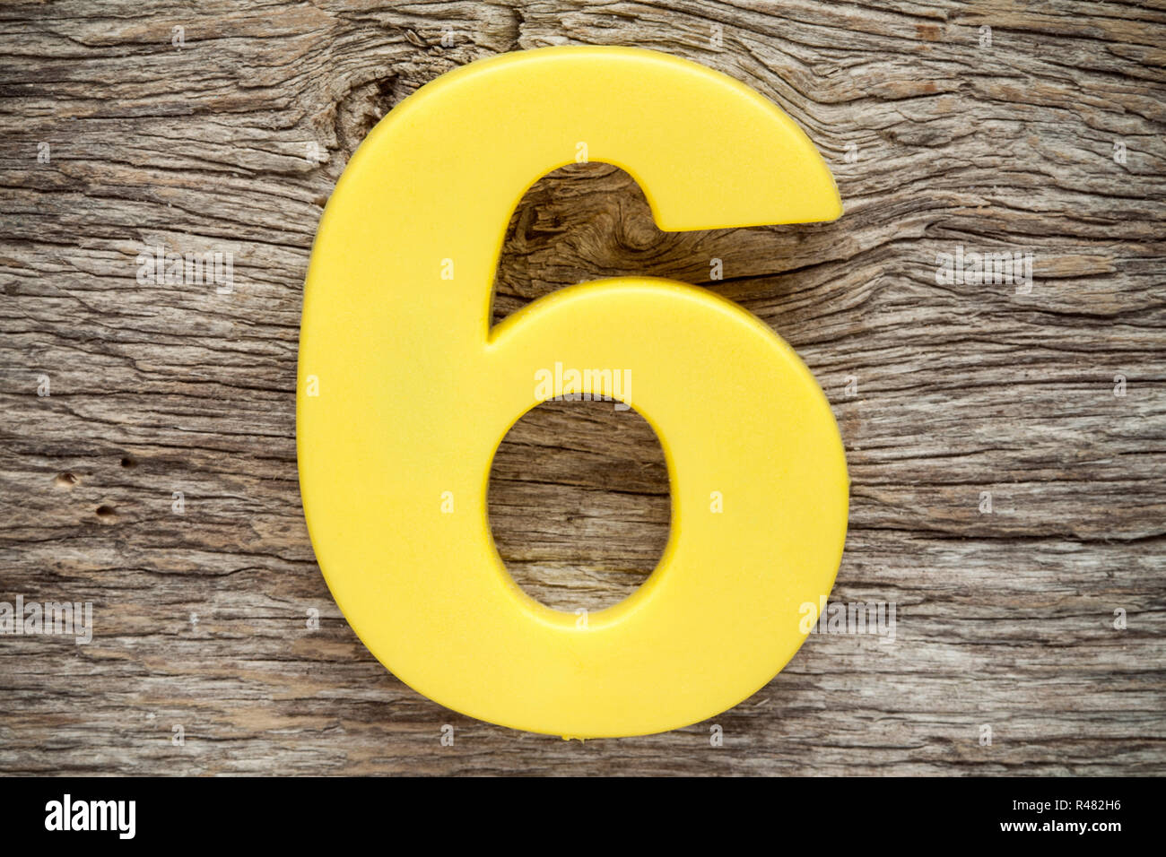 Yellow number six Stock Photo - Alamy