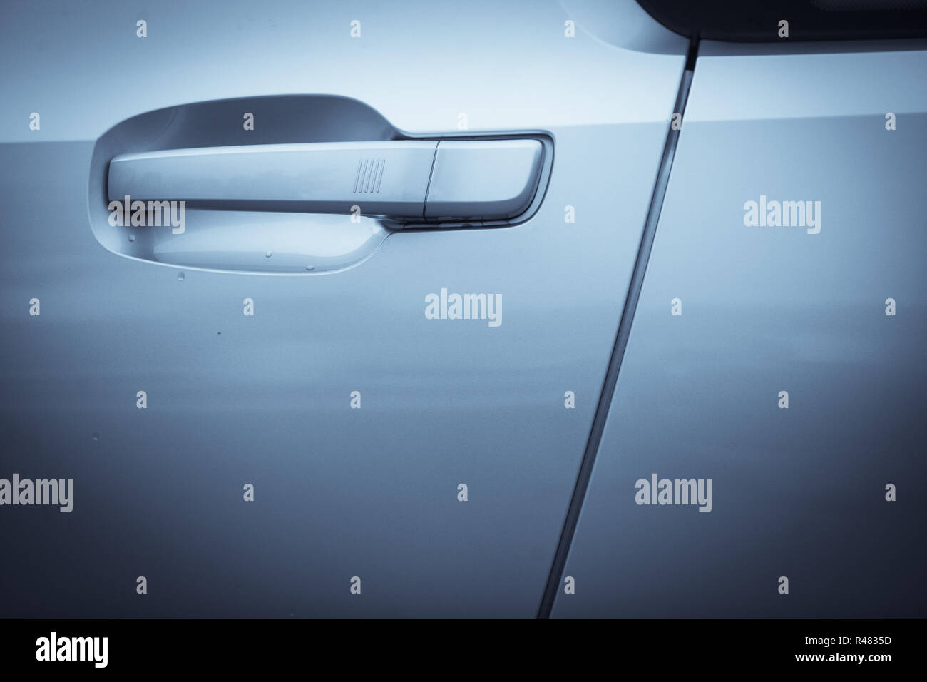 Car door handle Stock Photo - Alamy