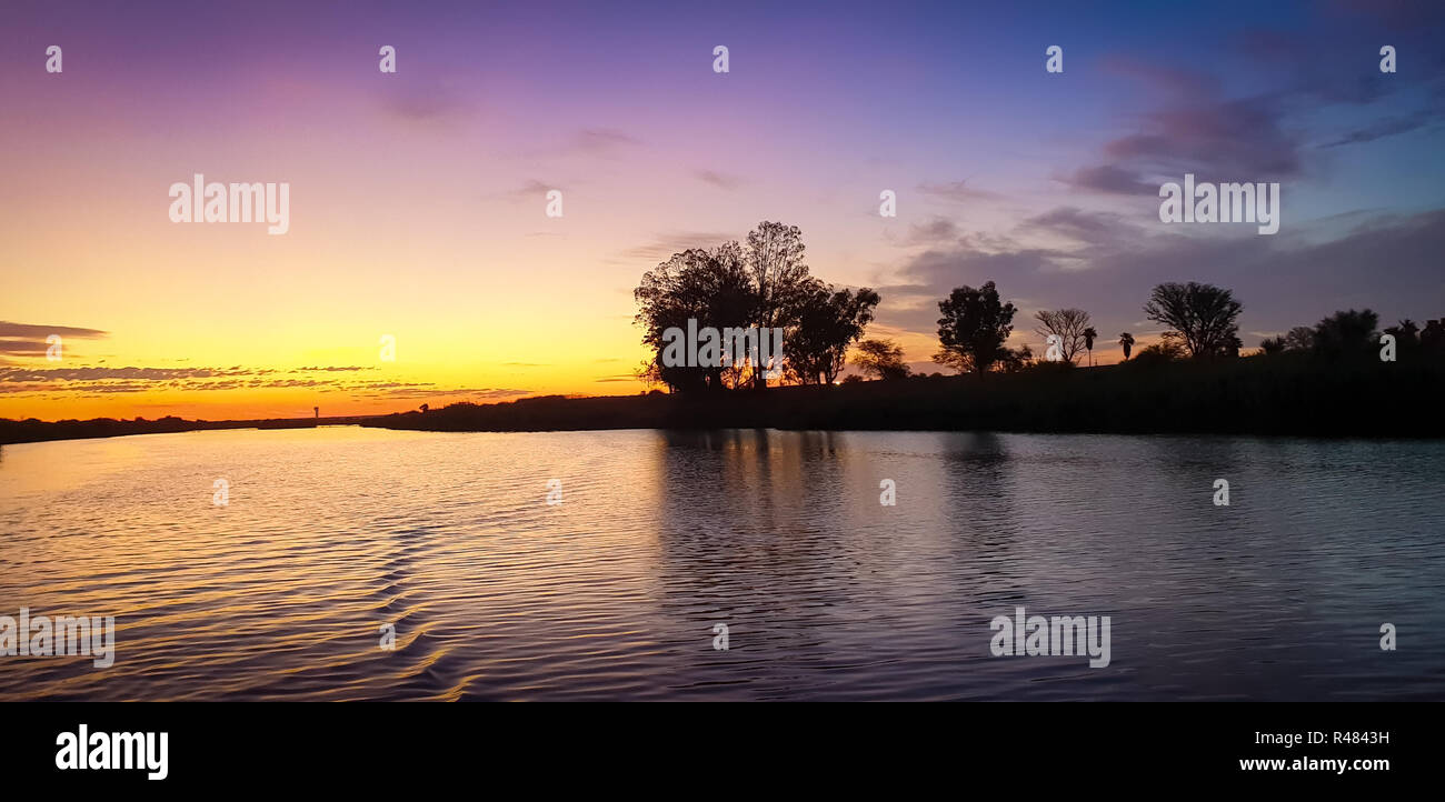 African Orange river sunset Stock Photo - Alamy