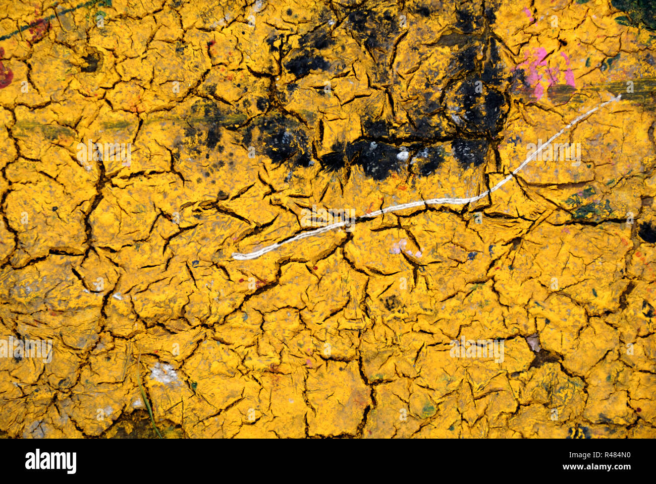 Yellow paint cracks from age Stock Photo - Alamy