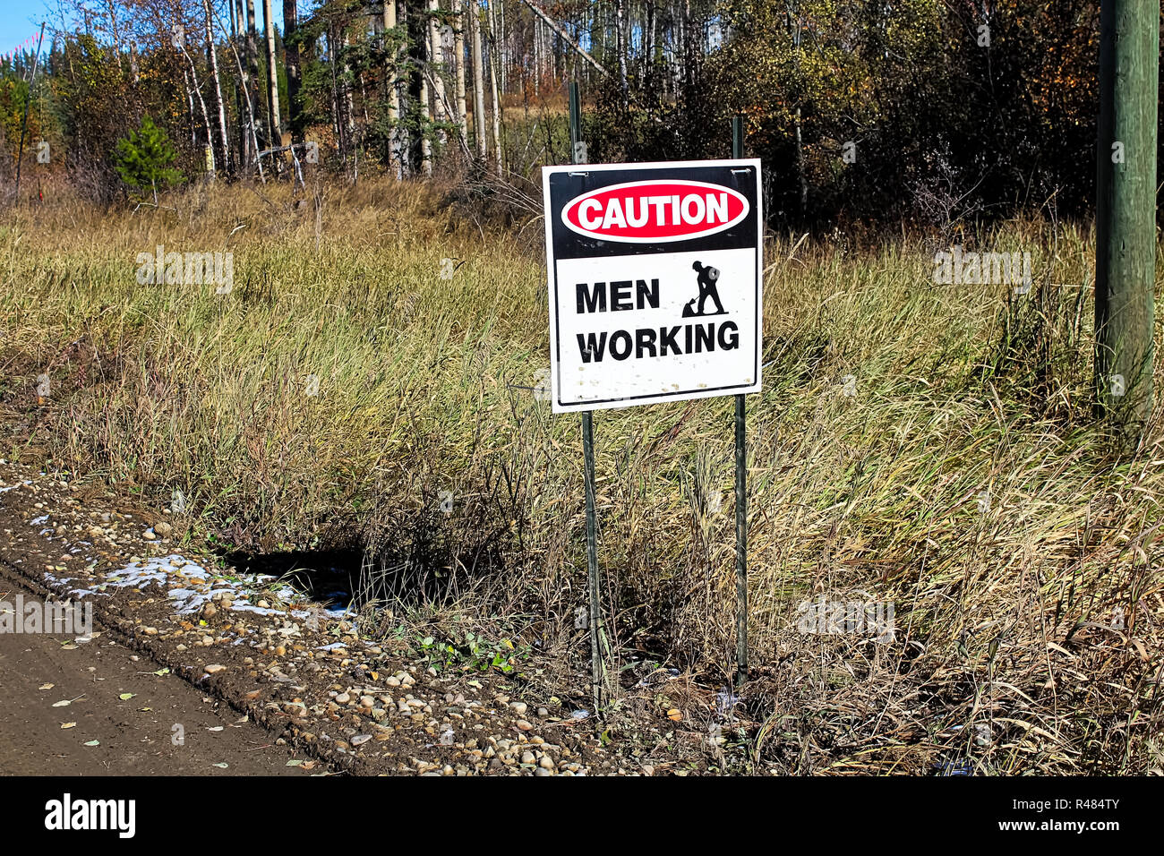Men working road sign hi-res stock photography and images - Alamy