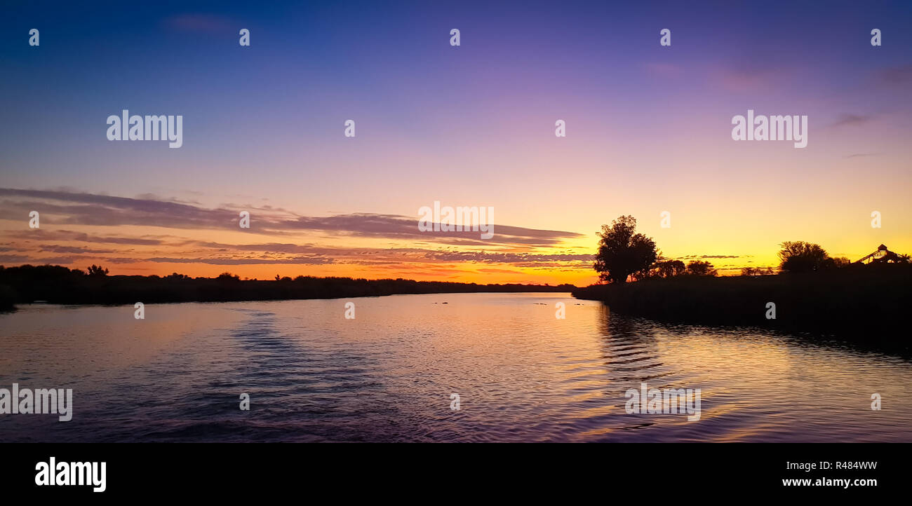 African Orange river sunset Stock Photo - Alamy