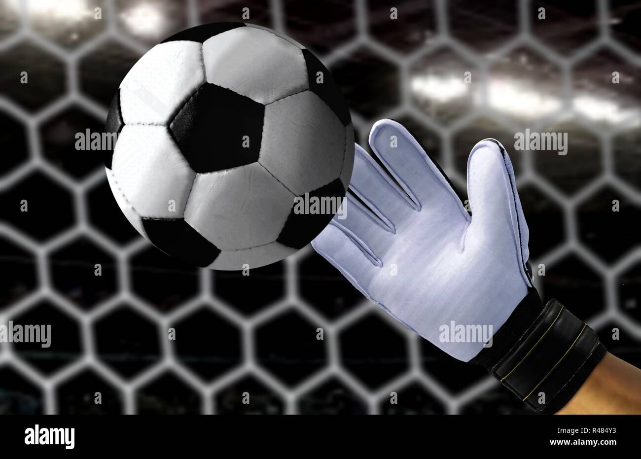 Goal keeper trying to catch a fast soccer ball Stock Photo - Alamy