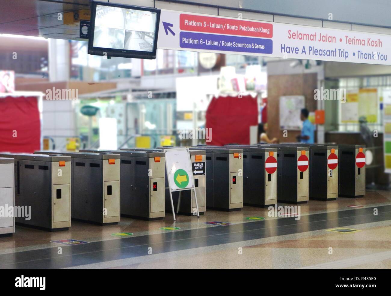 Rail station access gate Stock Photo - Alamy