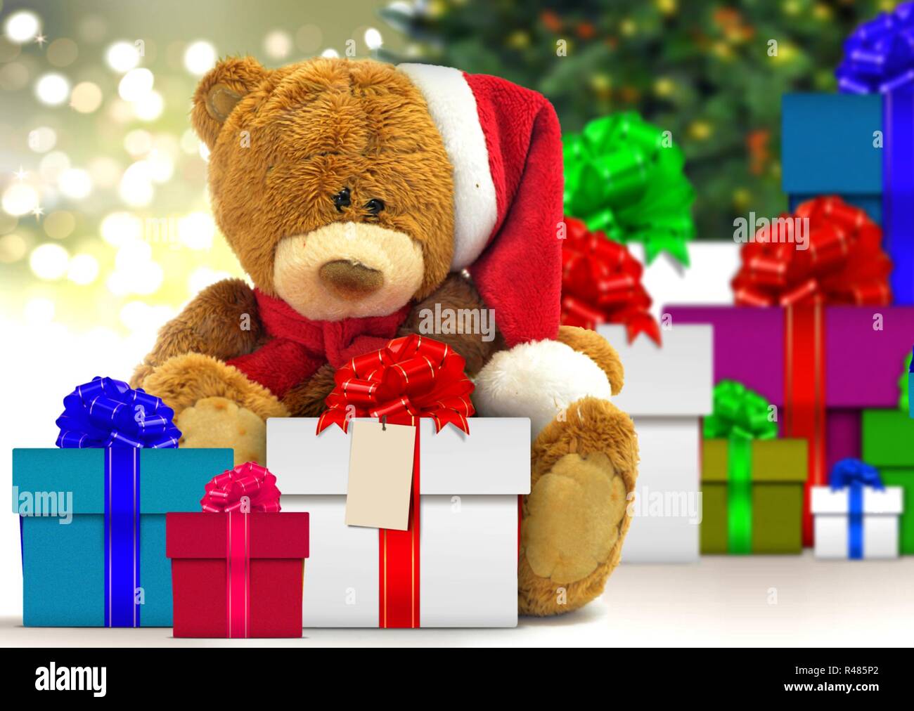 Teddy bear and christmas present Stock Photo - Alamy