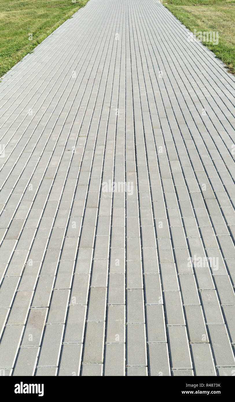 Footpath (sidewalk, road) of rectangular concrete slab Stock Photo - Alamy
