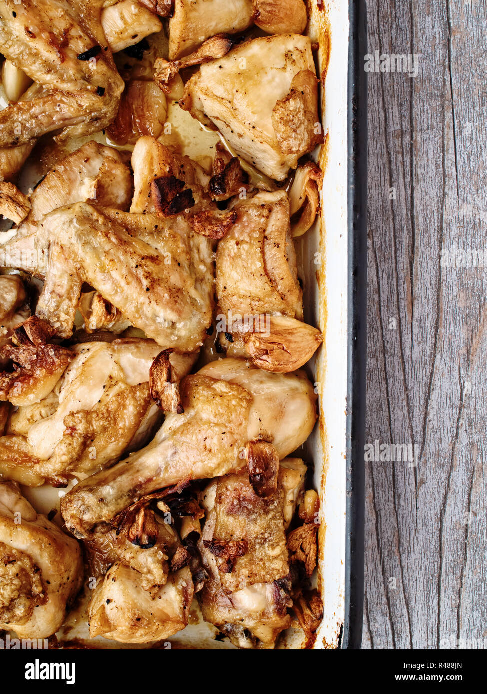 rustic golden roast chicken casserole Stock Photo - Alamy