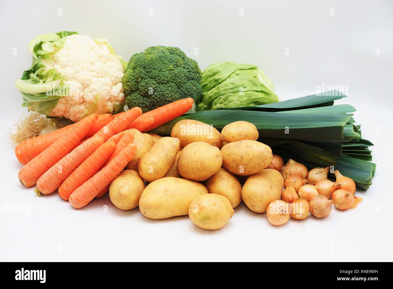 fresh organic vegetables on a white background Stock Photo - Alamy