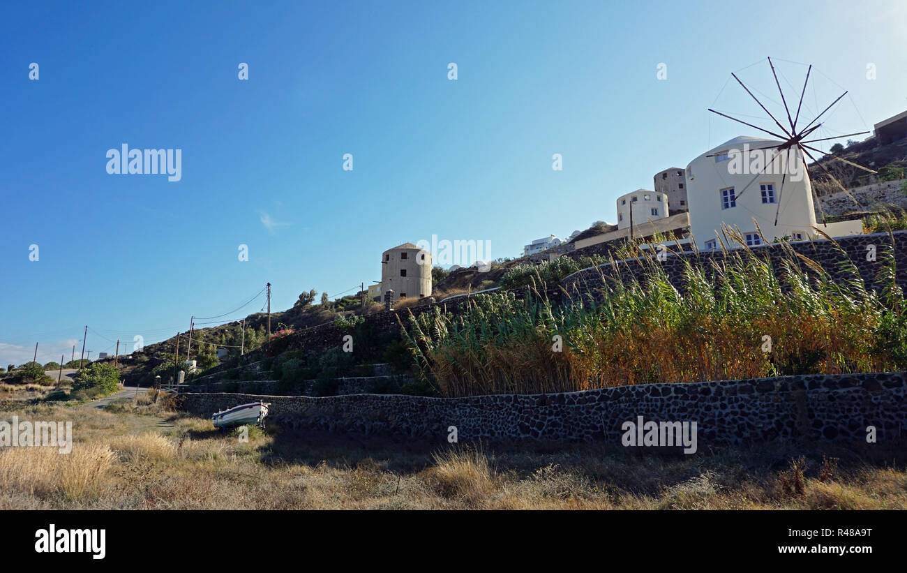 greece traditional windmill on iceland of santorini Stock Photo - Alamy