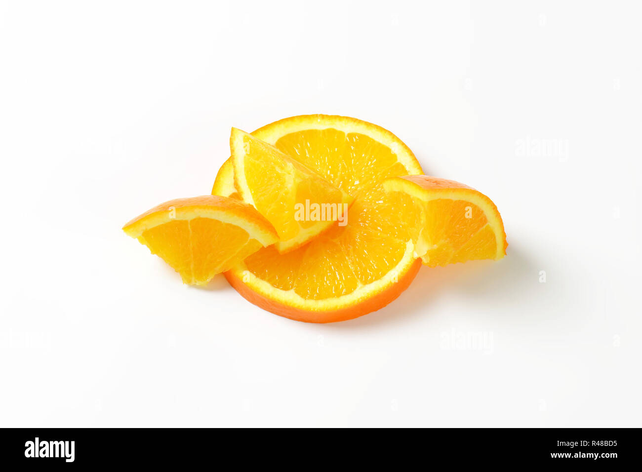 Fresh orange pieces Stock Photo - Alamy