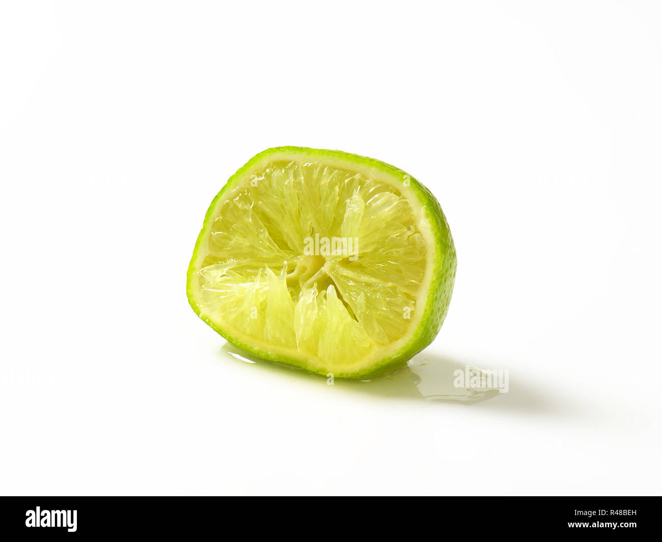 Squeezed lime fruit Stock Photo - Alamy