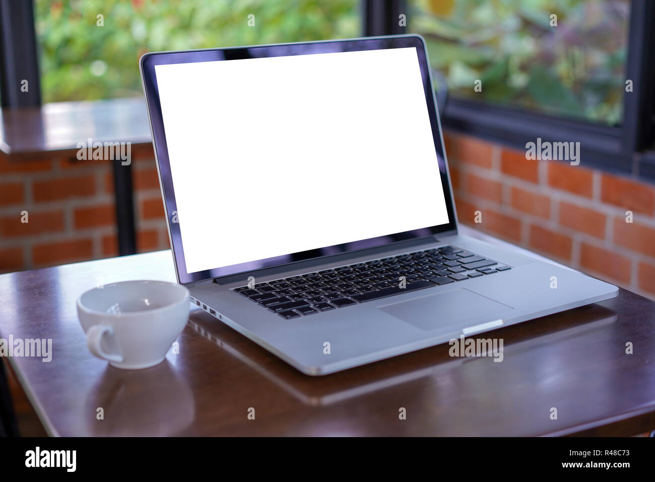 blank white screen workspace, Laptop computer advertising text message ...