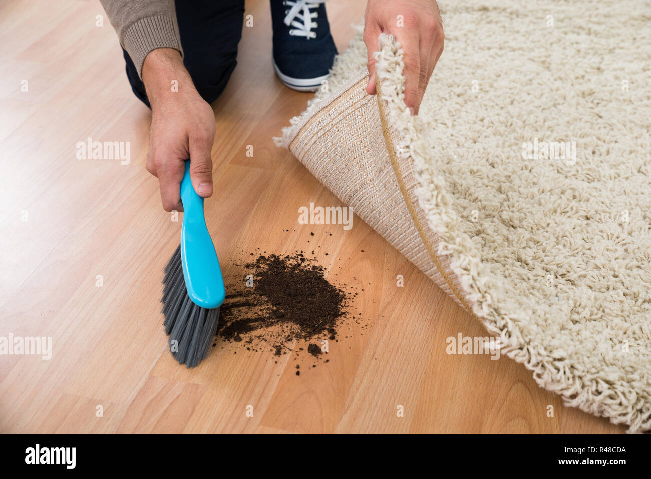 Work man using broom sweep hi-res stock photography and images - Alamy