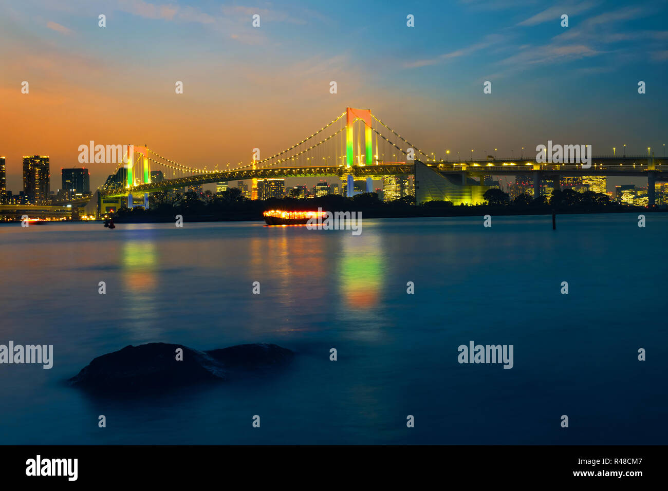 Colorful illuminations at Rainbow Bridge from Odaiba in Tokyo, Japan ...