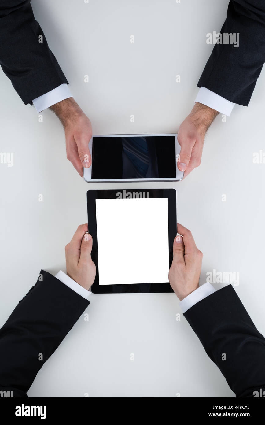 Two businessmen working tablets hi-res stock photography and images - Alamy