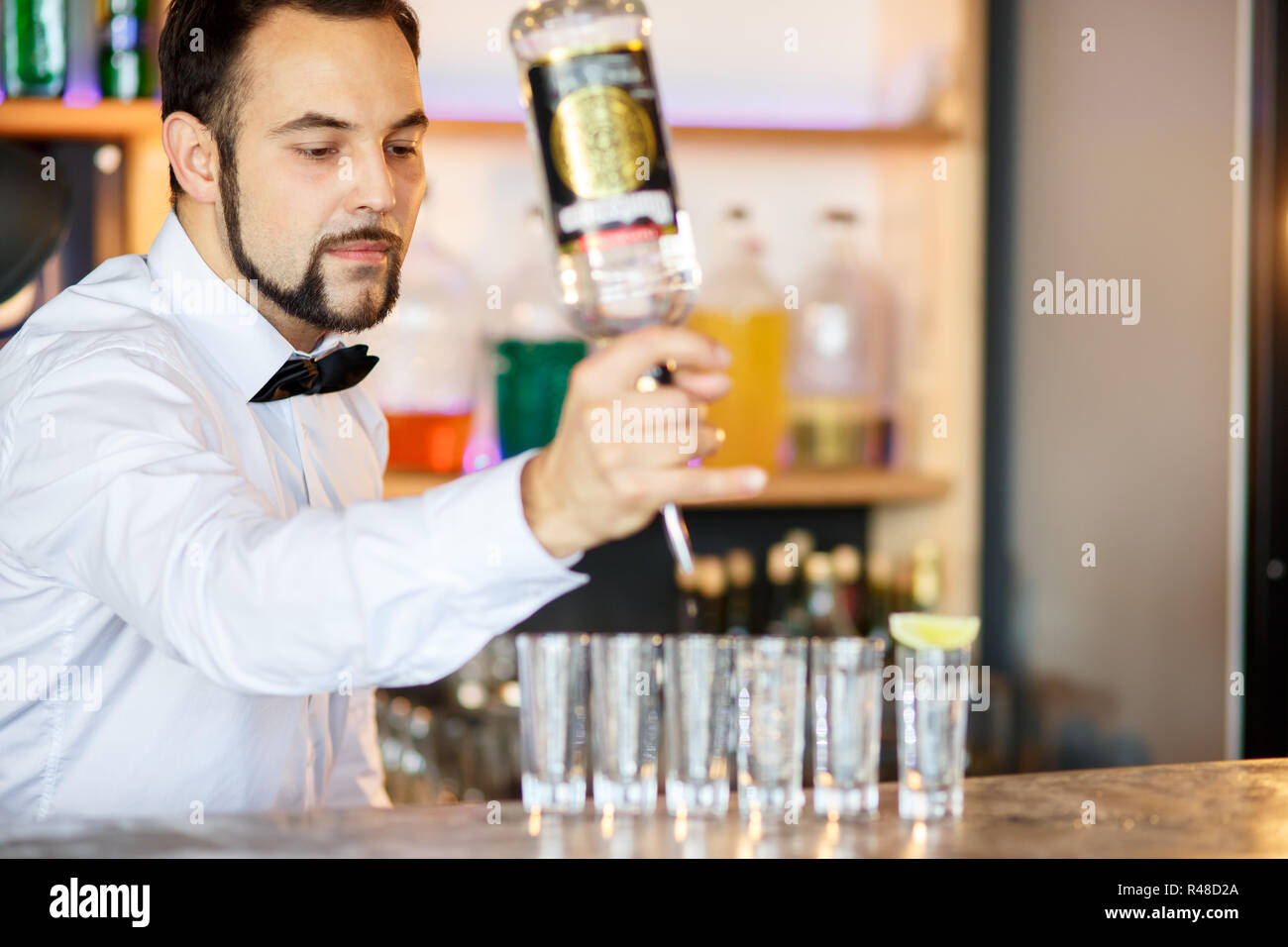 Barman at work, preparing cocktails Stock Photo - Alamy