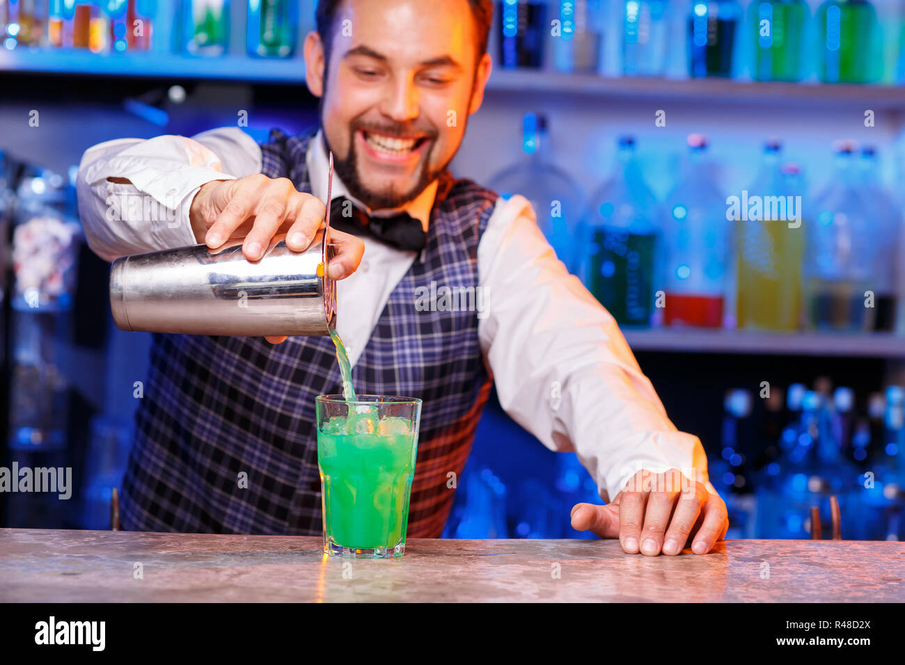 Barman at work, preparing cocktails Stock Photo - Alamy