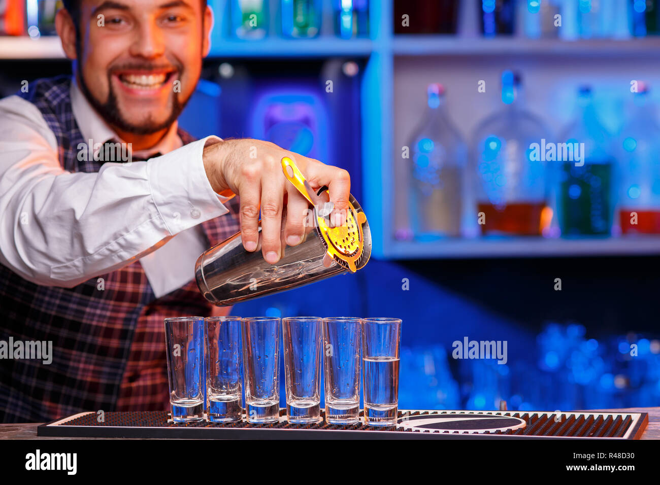 Barman at work, preparing cocktails Stock Photo - Alamy