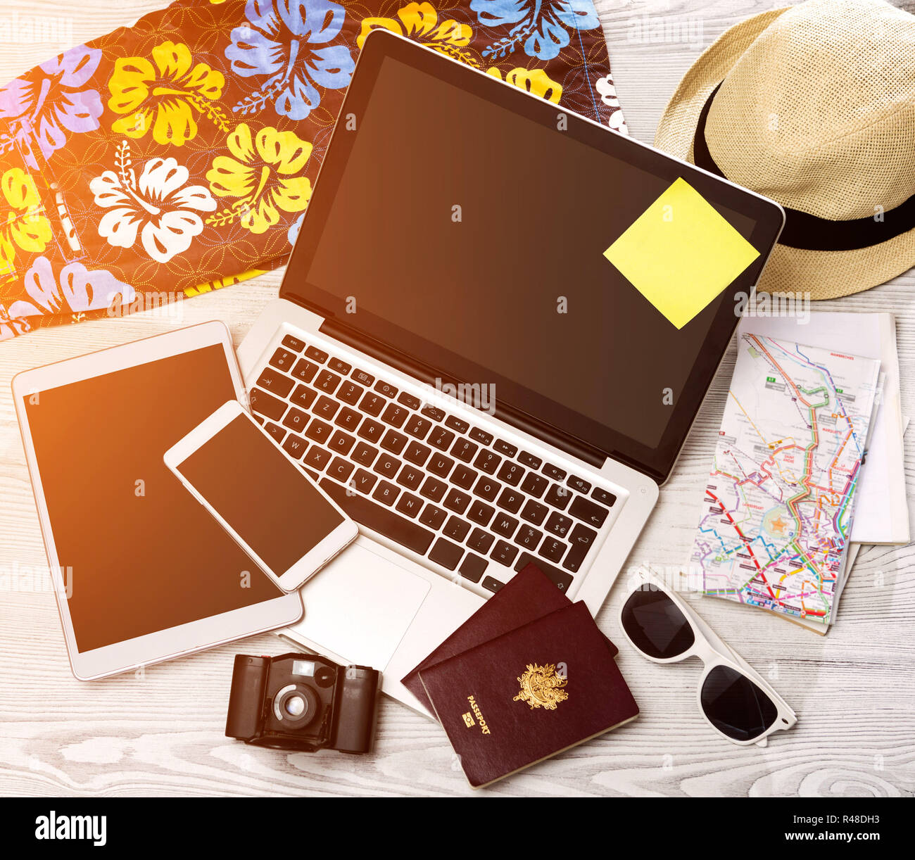 Wood tourist's desk in high definition with laptop, tablet and mobile ...