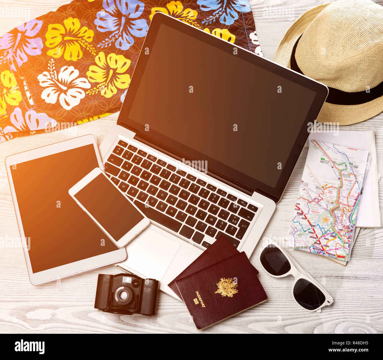 Wood tourist's desk in high definition with laptop, tablet and mobile ...