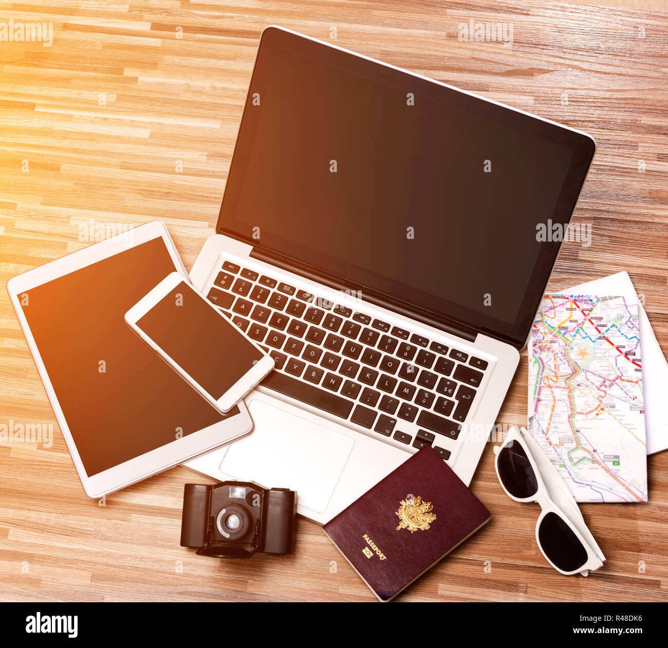 Wood tourist's desk in high definition with laptop, tablet and mobile ...